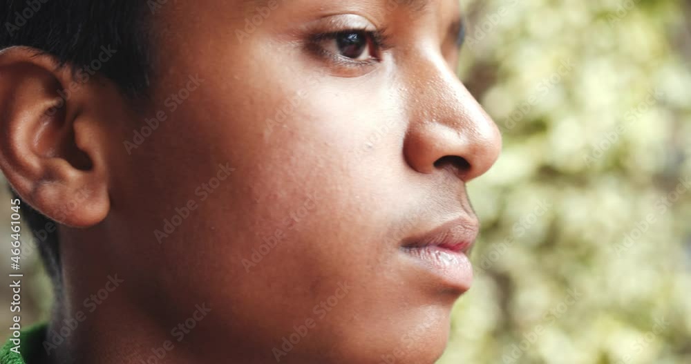 A 4K of a South Asian boy looking at the camera with a sad face. Shimla ...