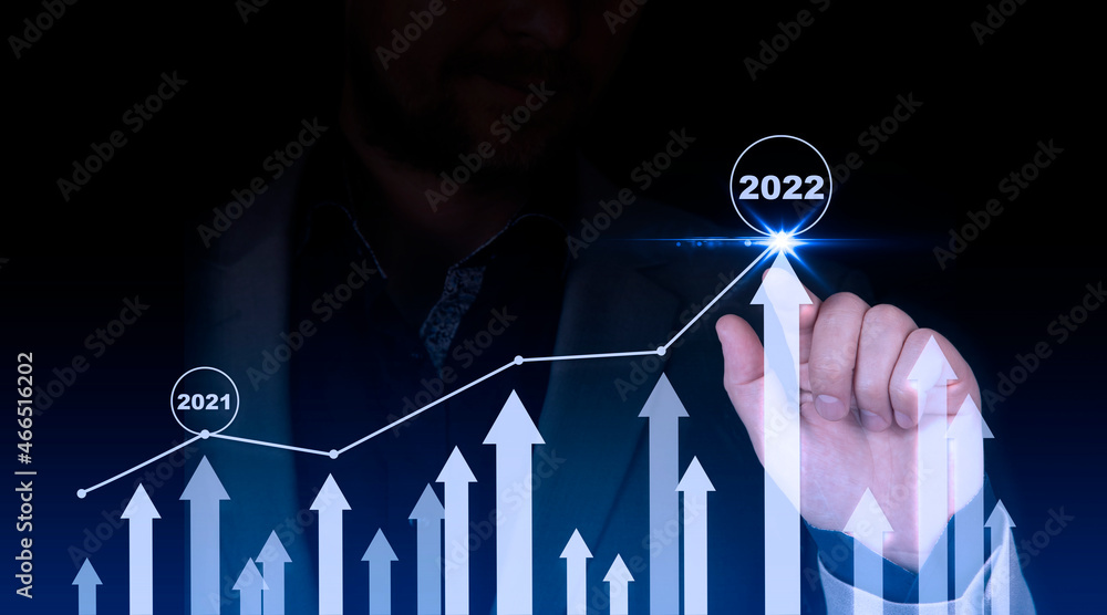 Businessman points to a graph with an arrow, corporate plan for future ...