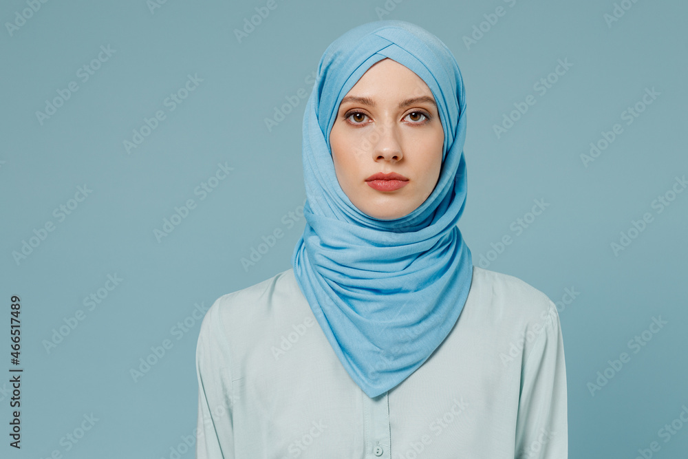 Young serious calm confident arabian asian muslim woman in abaya hijab ...