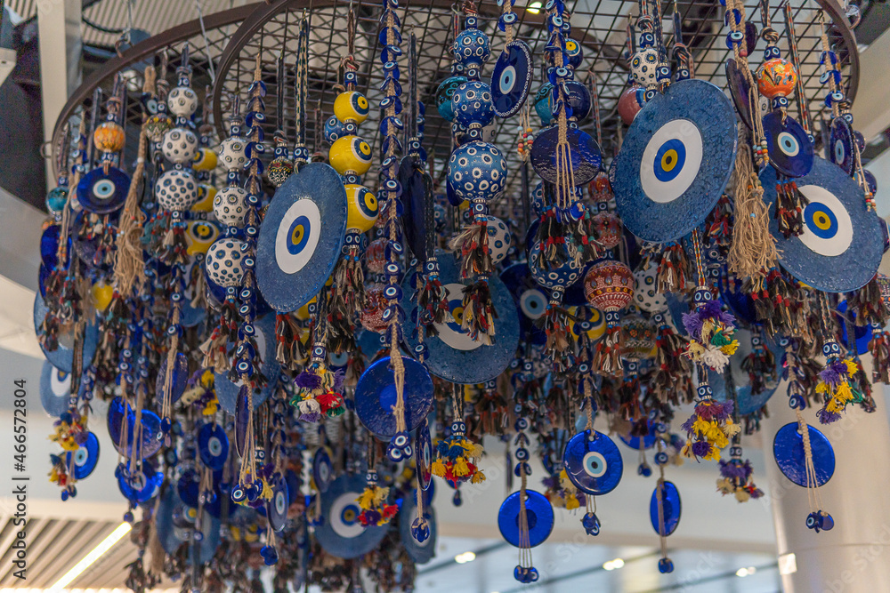 Multiple evil eye ornaments dangle from the ceiling at a gift shop in ...