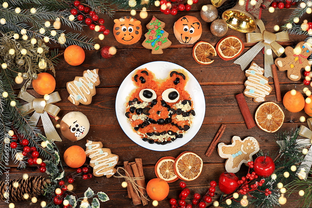 Christmas new year dishes, traditional festive tiger cub salad, symbol ...