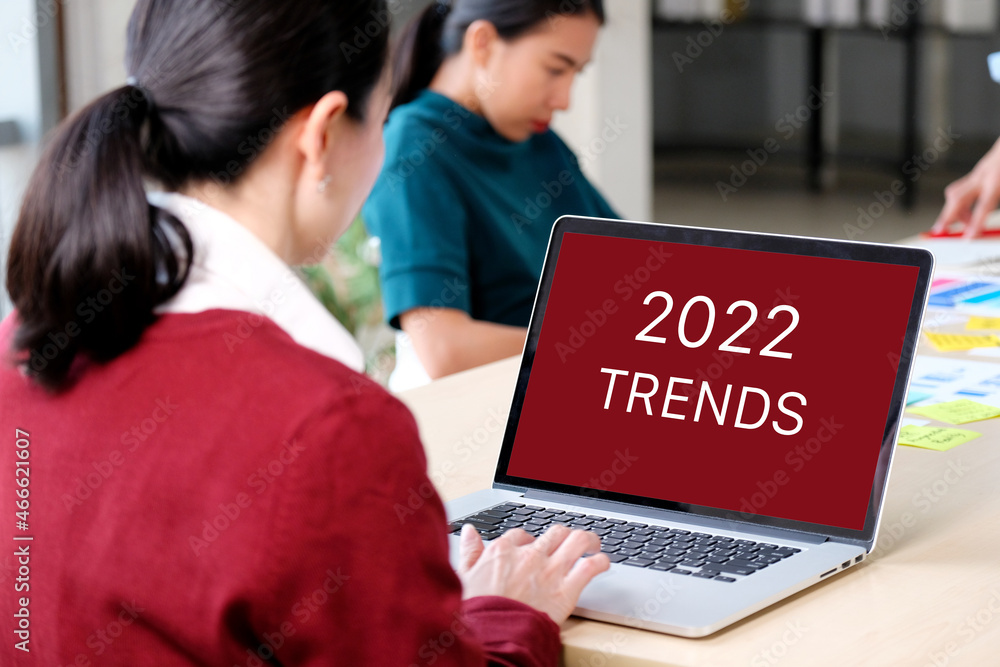 2022 trends on laptop computer screen background, business plan and ...