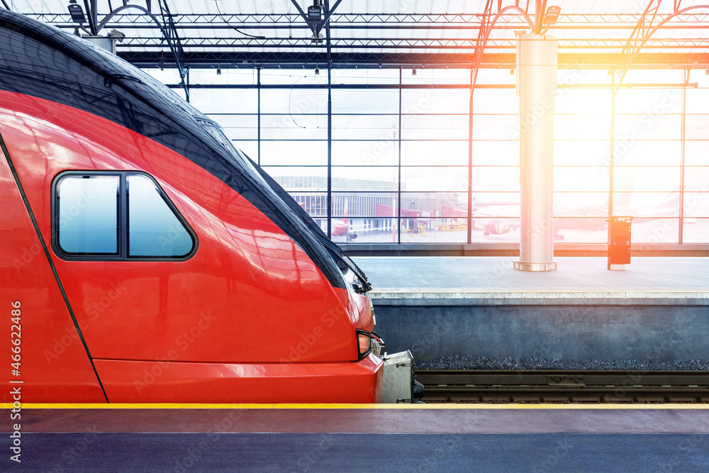Red modern train at the station. Public subway transport concept with ...