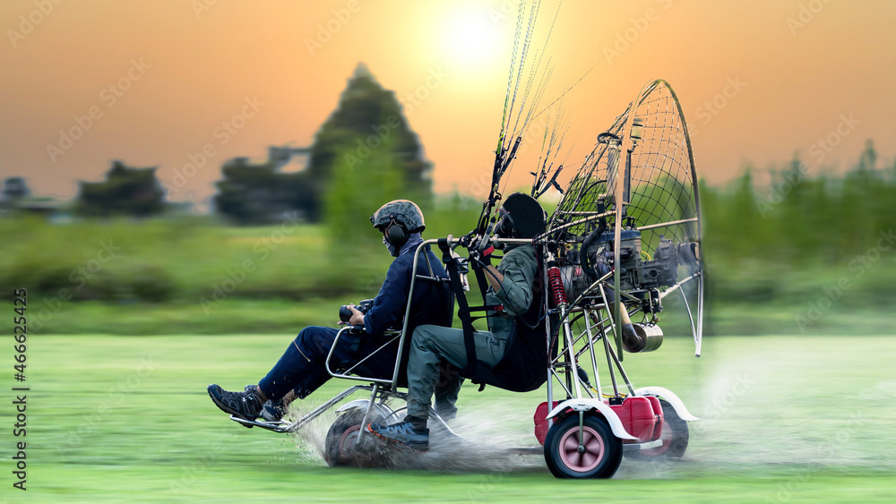 Two men flying and gliding in the air, Flying on paramotor, Preparation ...