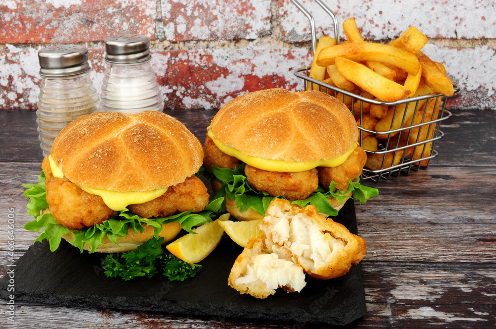 Battered cod fish nugget sandwiches with mayonnaise and lettuce in ...