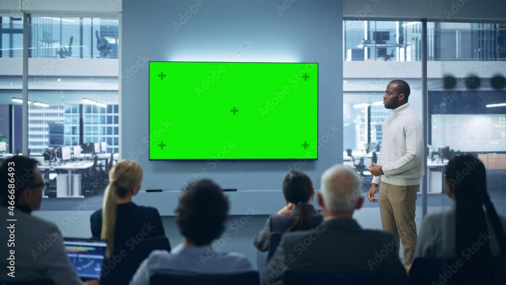 Modern Product Presentation Event: Black Businessman Speaks, Uses Green ...