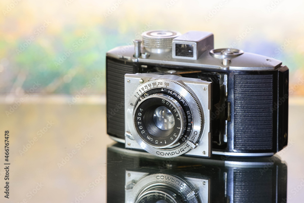 beautiful vintage camera with colored background on glass backing Stock ...
