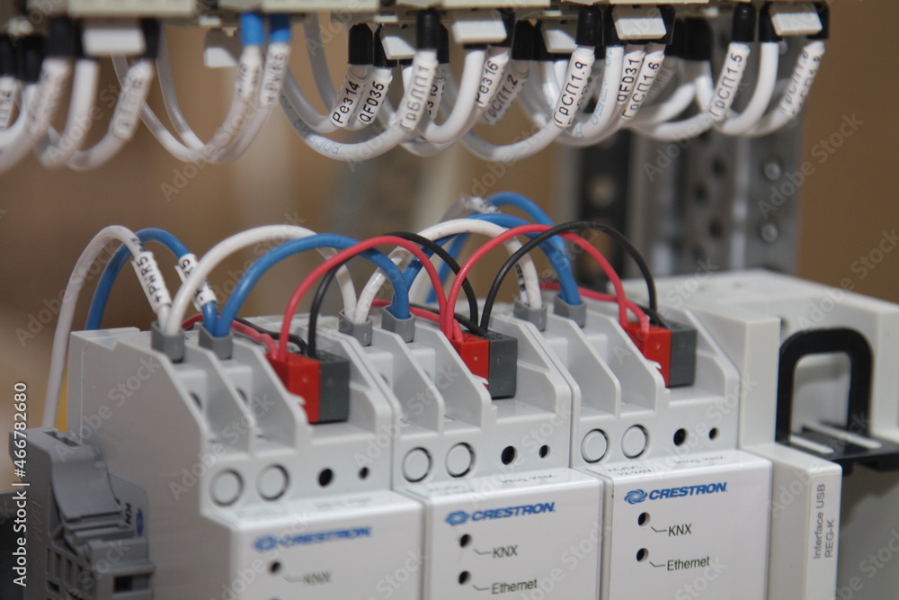 Fotografia do Stock: The Crestron CI-KNX signal converters and the Mean Well power supply module ...