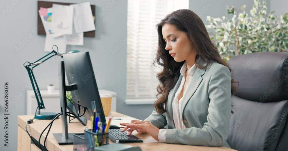 Pretty hard-working secretary of company assistant to boss manager sits ...