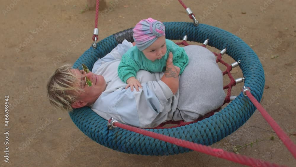 Disabled person with toddler, lifestyle outdoors. Congenital ...