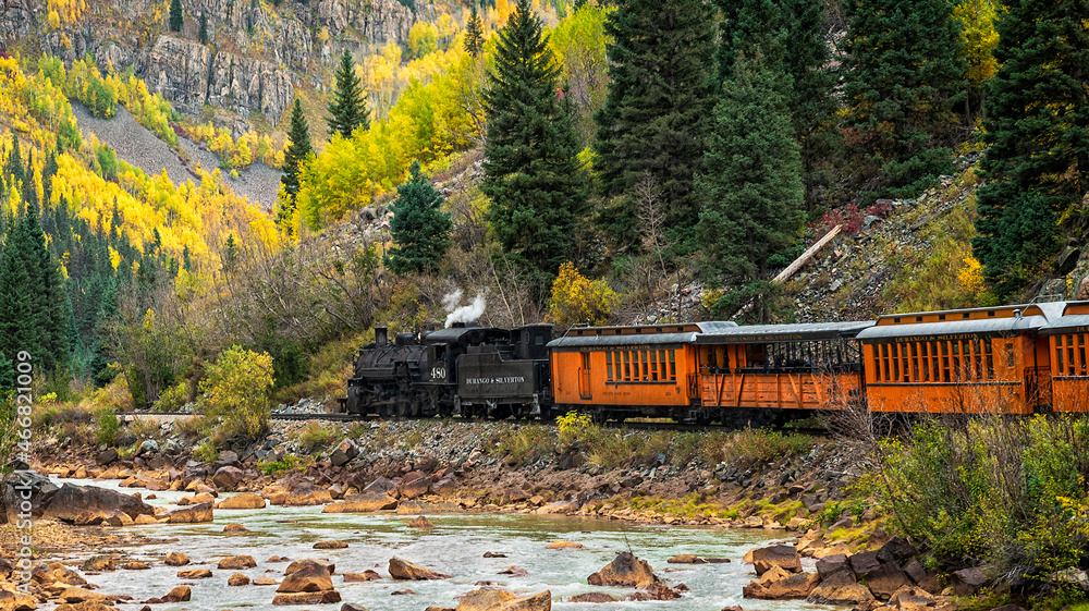 The Durango & Silverton narrow gauge steam train chugs along the copper ...