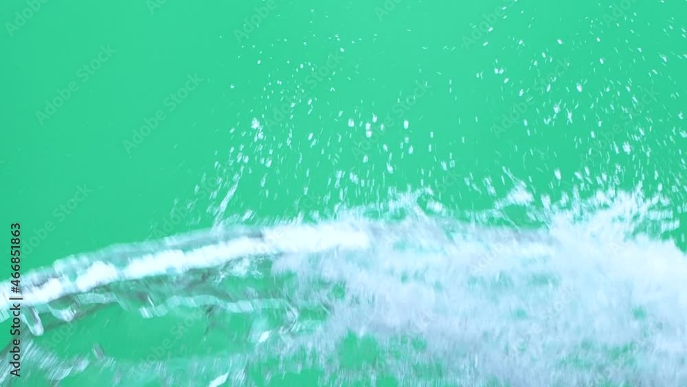 Slow motion of water spash with drops over green screen chroma key ...