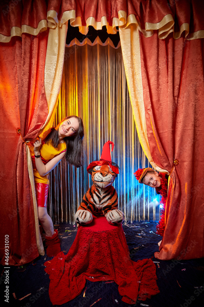Family during a stylized theatrical circus photo shoot in a beautiful ...