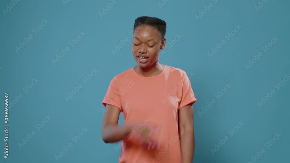 Annoyed person showing offensive middle finger to insult in studio ...