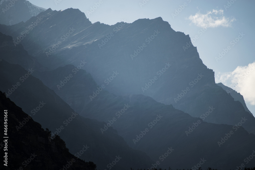 Hazy layered mountain peaks in morning. Landscape of foggy mountain in ...