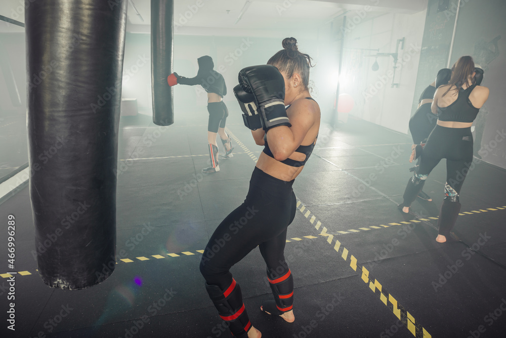 Boxer woman. Boxing fitness woman smiling happy wearing black boxing ...