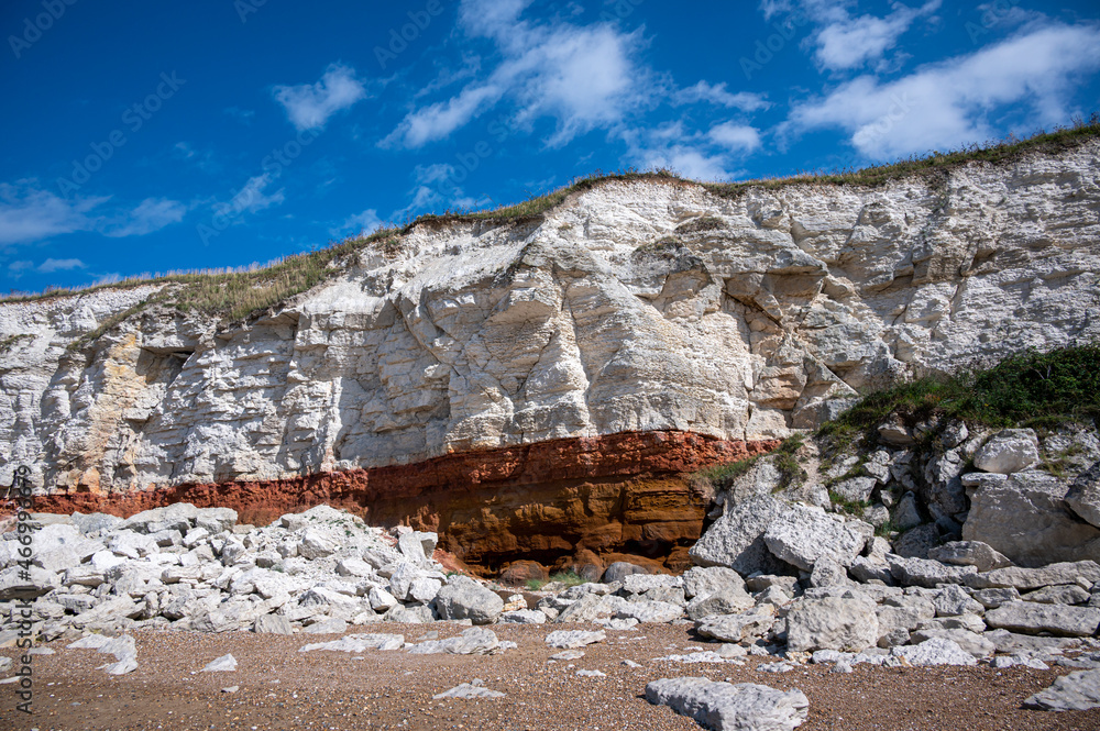 Red and white striped cliffs at Hunstanton, Norfolk, caused by layers ...