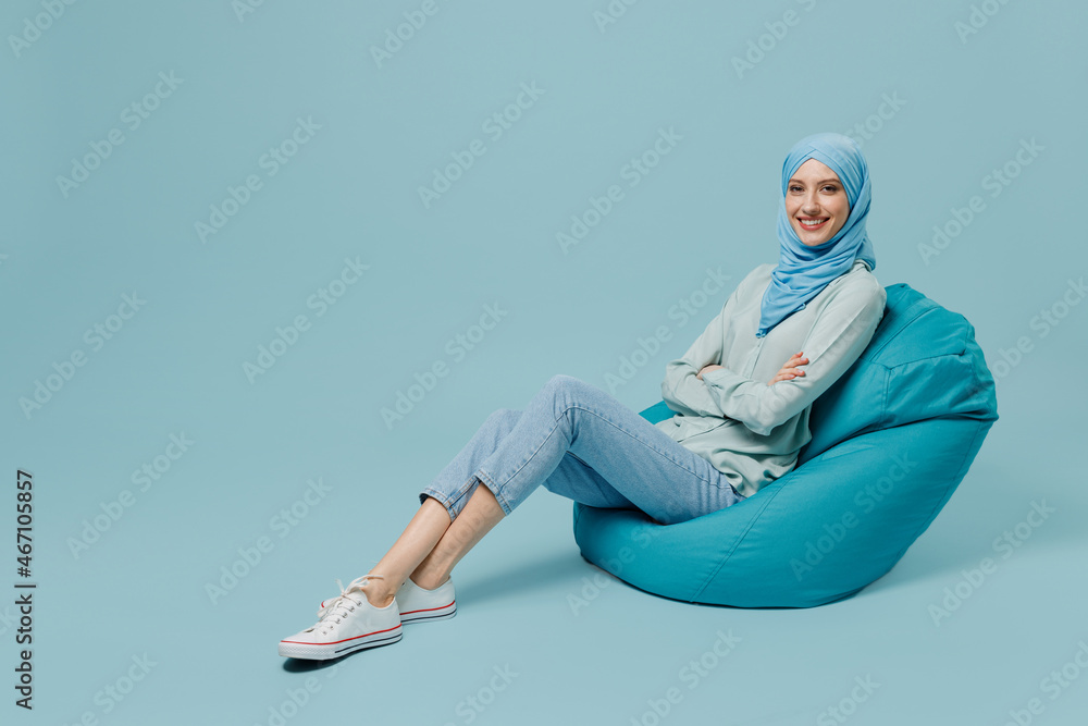 Full body smiling happy cheerful young arabian asian muslim woman in ...