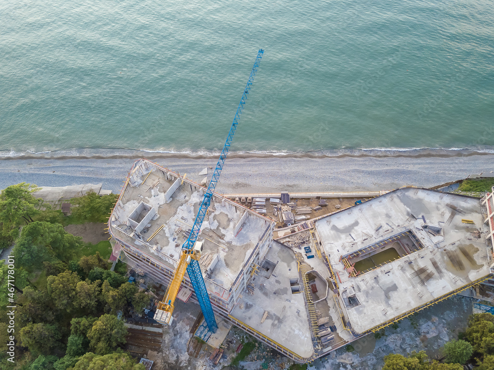 Top view from the drone of a multi-storey building under construction ...