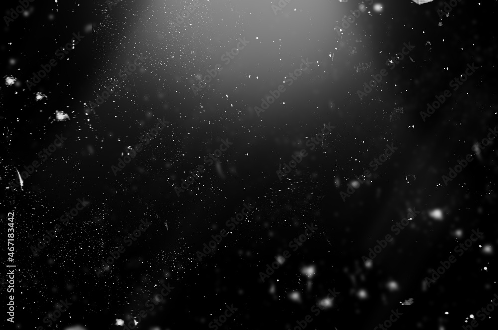falling particles on a black background. can be used with screen ...