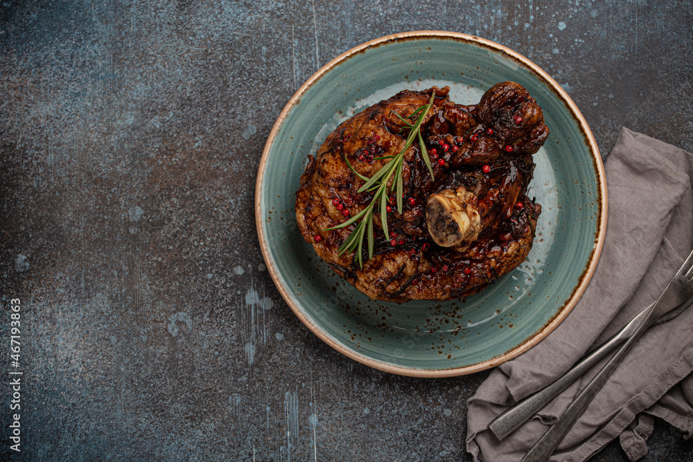 Delicious roasted ham or pork knuckle with glazed brown crispy skin ...