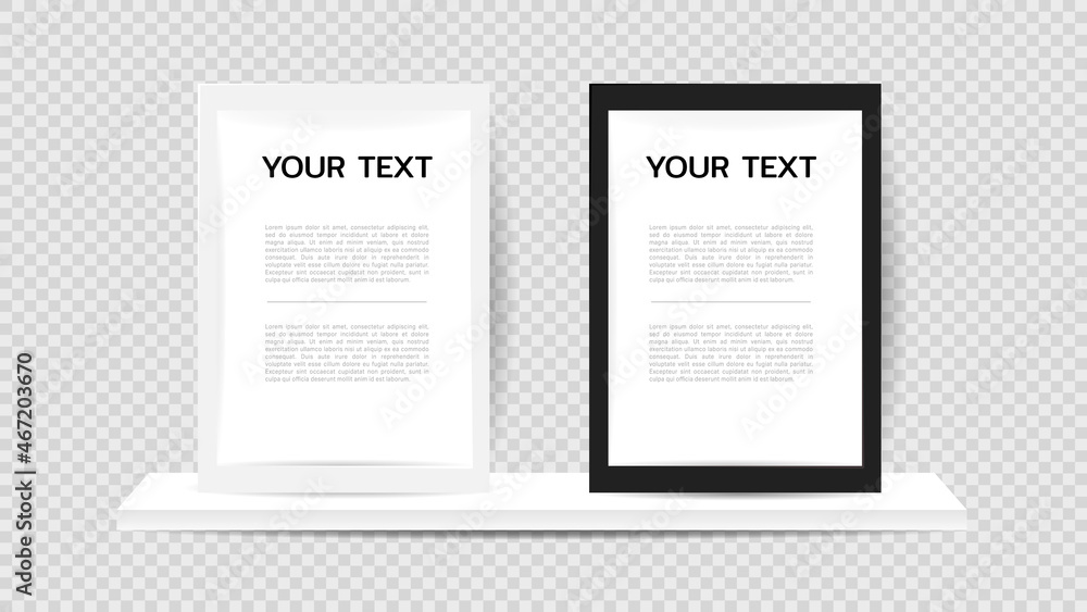 White and black picture frames are placed on a white wall shelf on ...