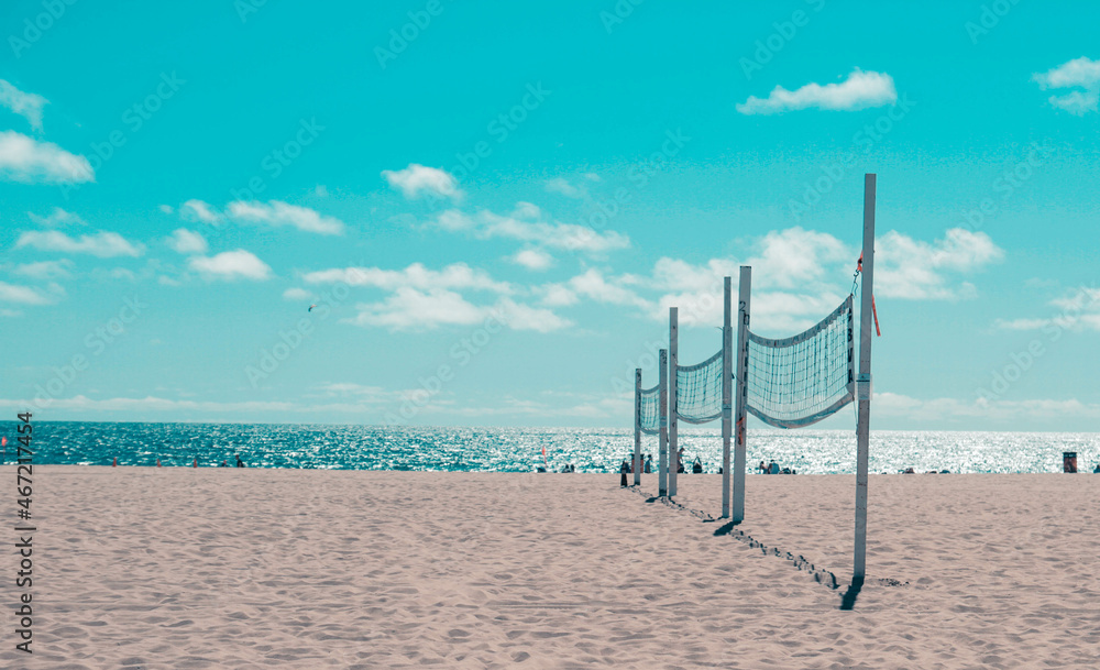 Side view of volleyball nets on seashore Stock Photo | Adobe Stock