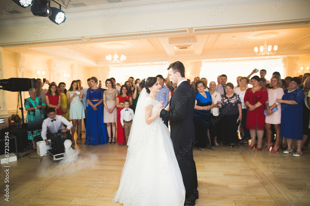 Beautiful caucasian wedding couple just married and dancing their first ...