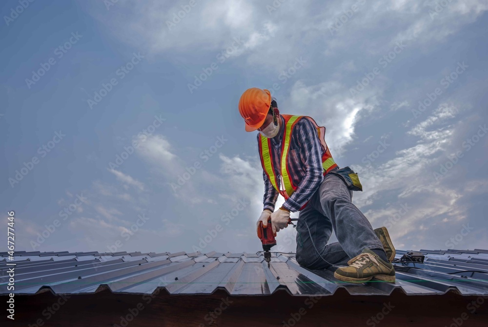 Construction expertise worker wear safety uniform install new roof ...