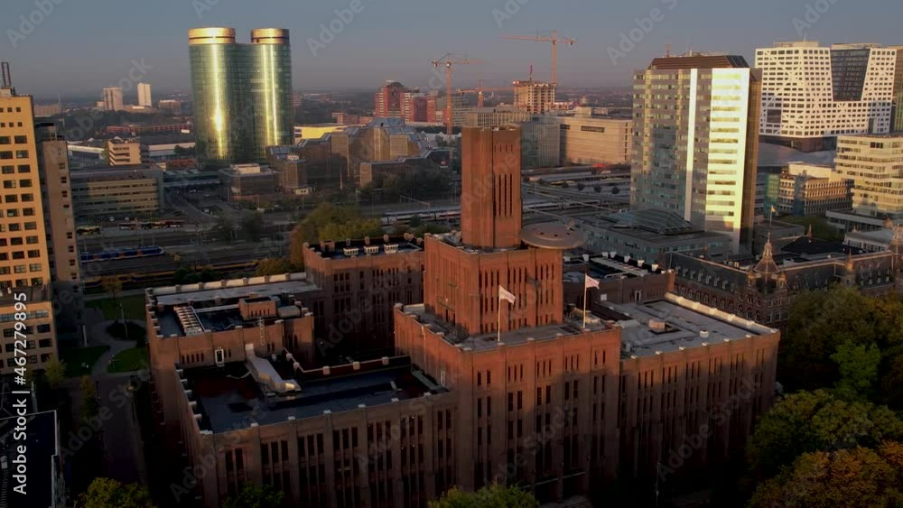Sideways pan showing sunrise illuminating the Inktpot building with UFO ...