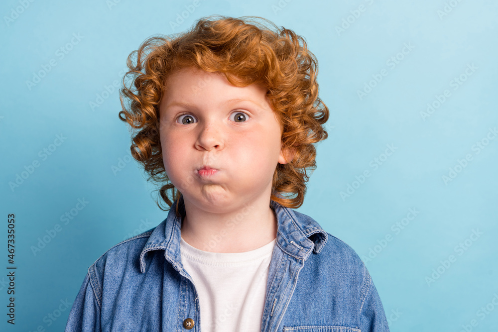 Photo of foolish playful funny little boy puffed inflate cheeks wear ...