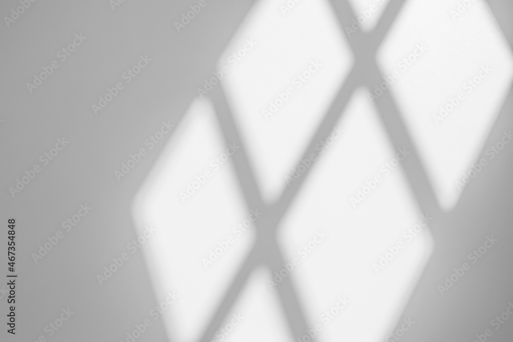 Gray window shadow and light blur abstract background on white wall ...