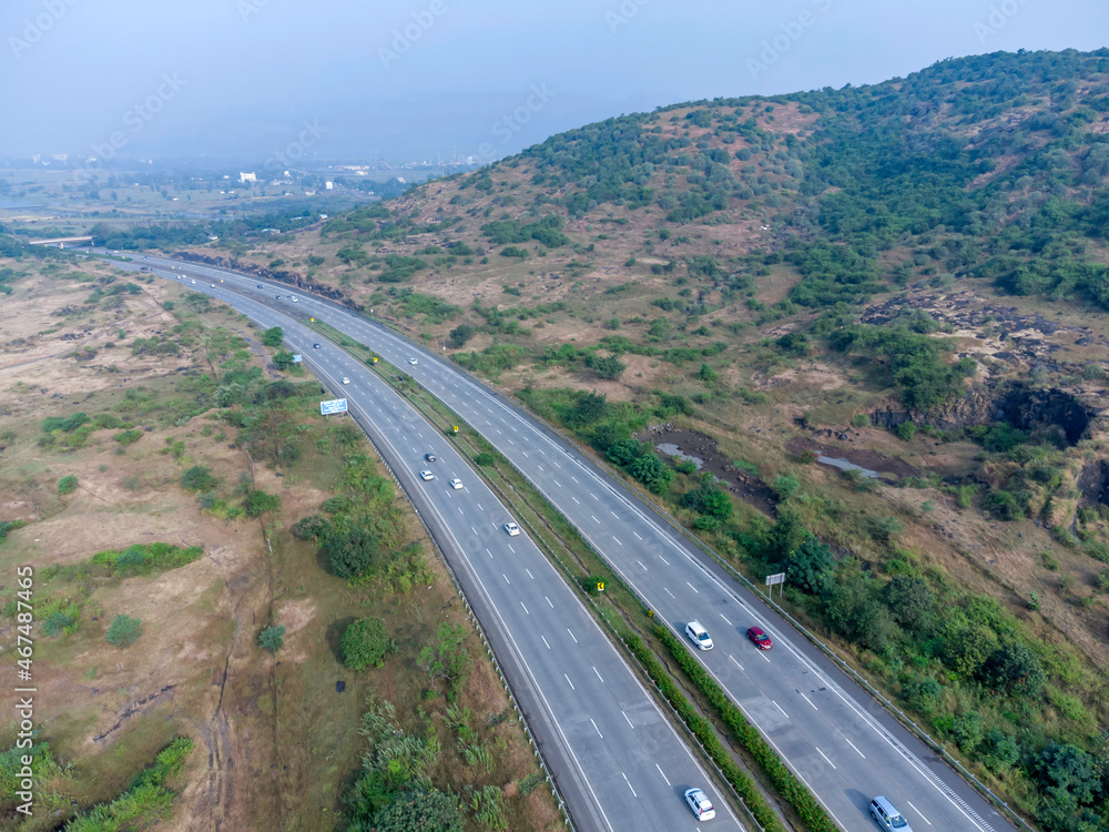 Aerial footage of the Mumbai-Pune Expressway near Pune India. The ...