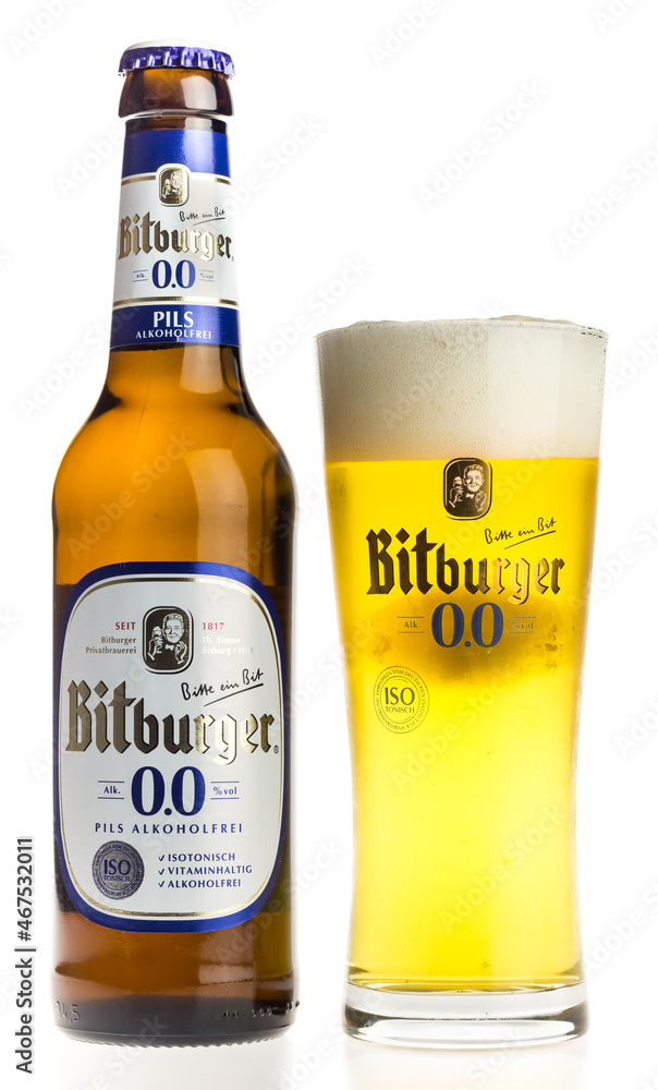 Bottle and glass of German non-alcoholic Bitburger lager beer isolated ...