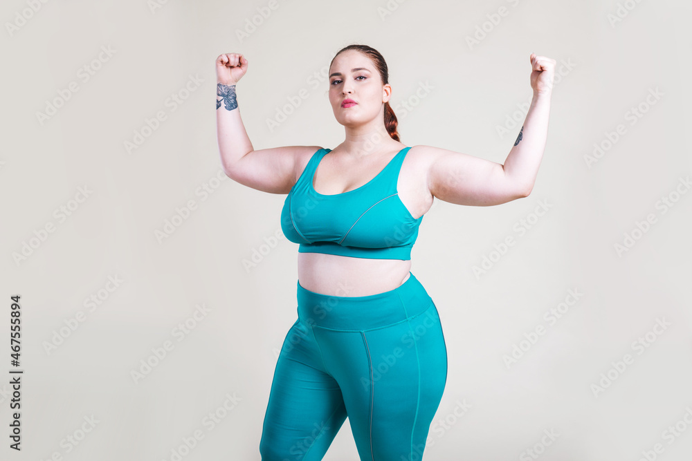 Curvy women posing in studio for a body positive photosession Stock ...