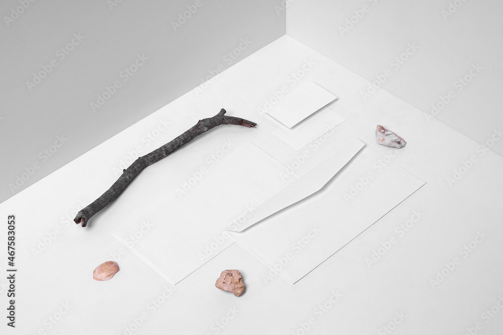 Stationery mockup for branding projects, with foliage elements such as ...