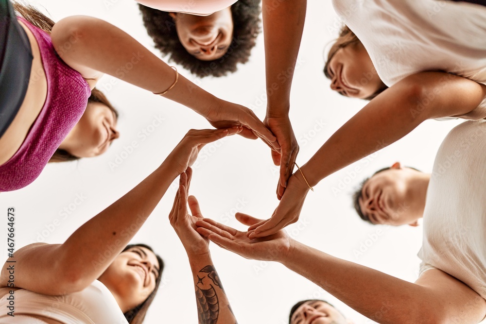 Group of young friends doing circle symbol with hands together Stock ...