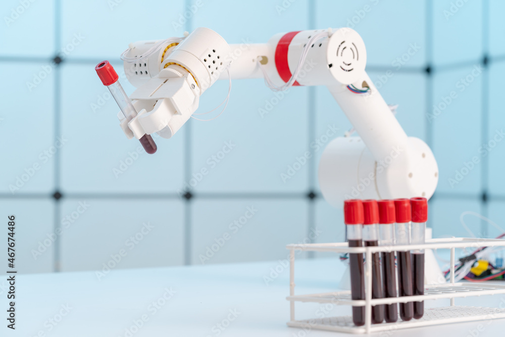 Robot arm with test tube for biological experiments in laboratory Stock ...