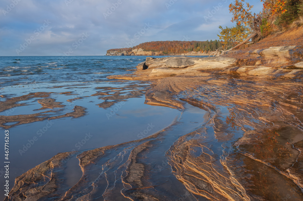 Autumn landscape of the sandstone shoreline of Lake Superior at ...