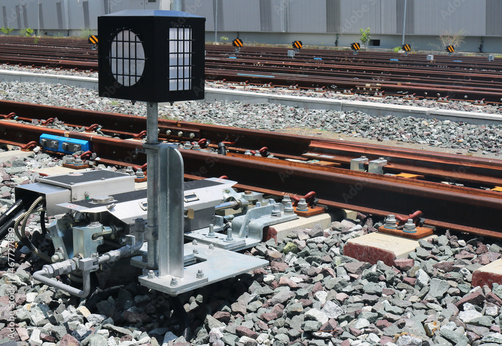 Signalling light system with point machine installed on the railway ...