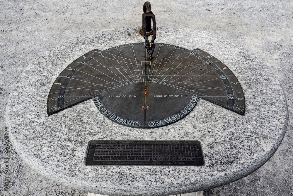 Horizontal sundial made of bronze, engraved with the hour lines of the ...