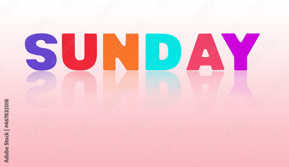 SUNDAY isolated on white background. Colorful wooden english alphabets ...