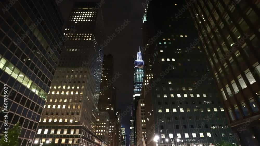 New York City at night. skyscrapers buildings street in Manhattan ...