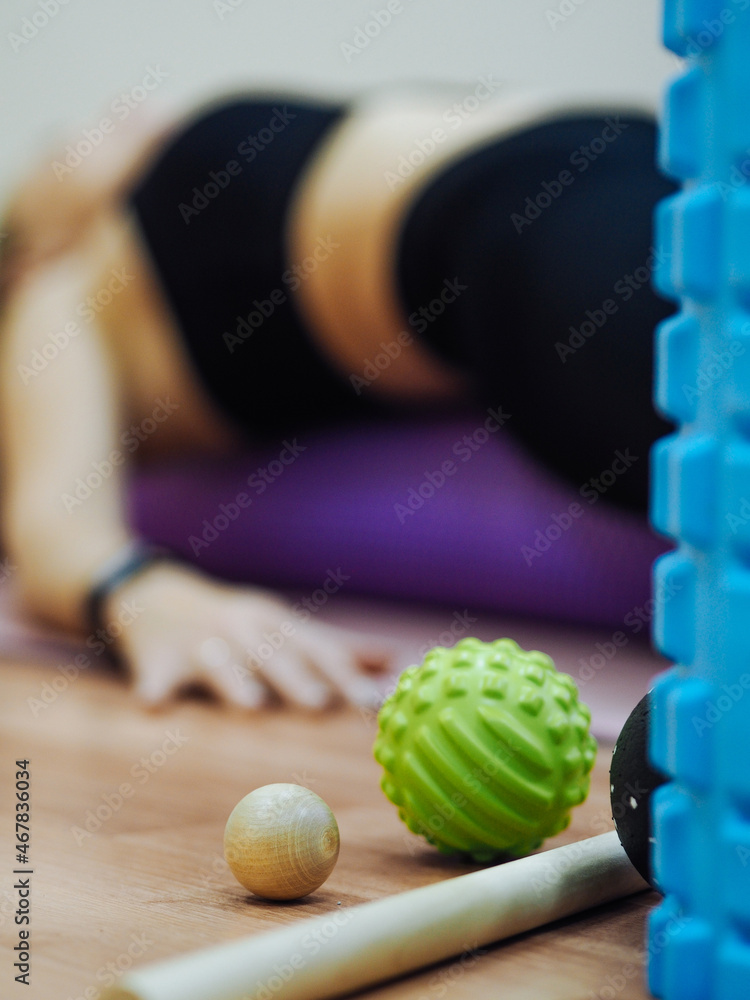 young model lying on a roll for miofascial release to smooth muscle ...