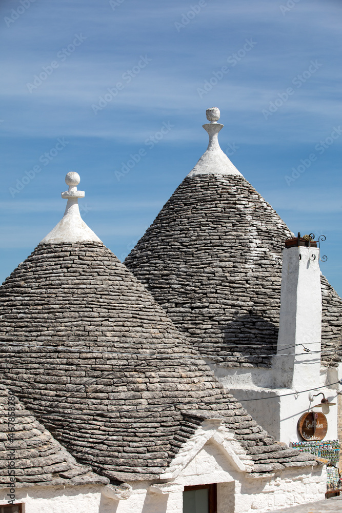 Stone roofs of Trulli Houses in Alberobello; Italy. The style of ...