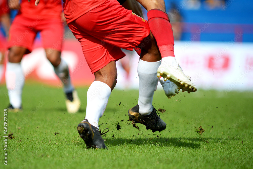 Foto de Concept of injury from playing football. Clashing in football ...