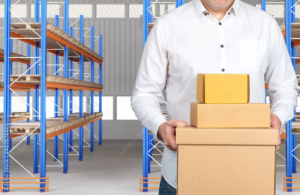 Warehouse manager with boxes. Concept - work in warehouse business ...