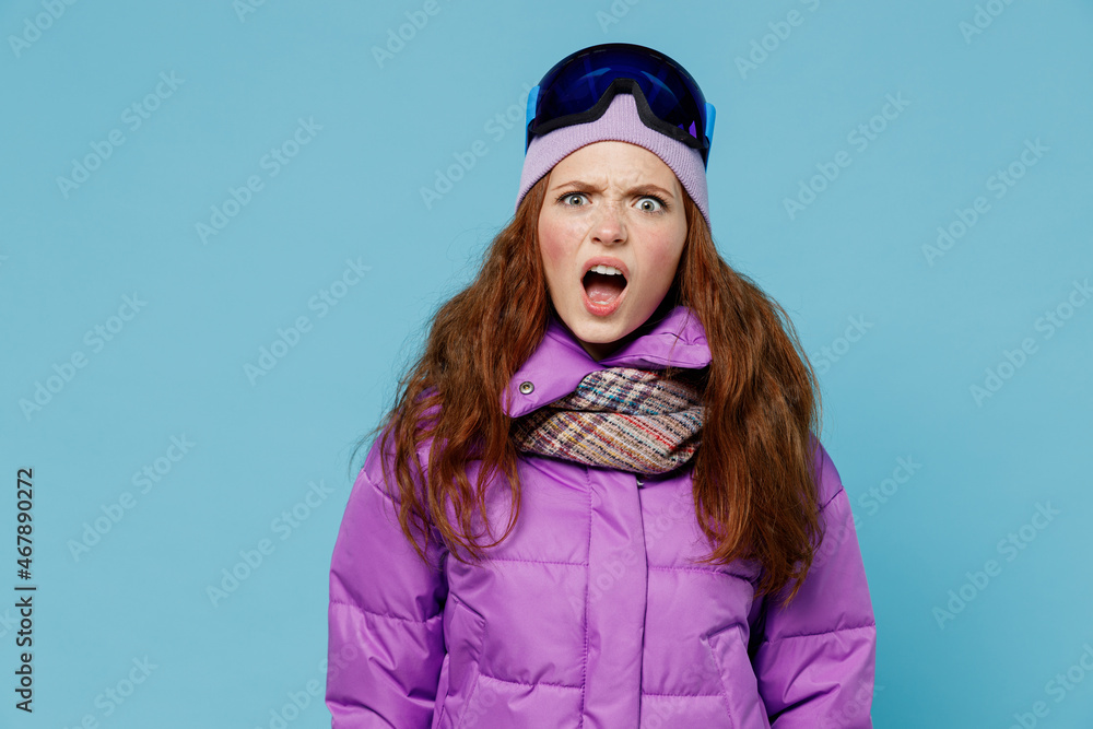 Skier sad angry woman in warm purple padded windbreaker jacket ski ...