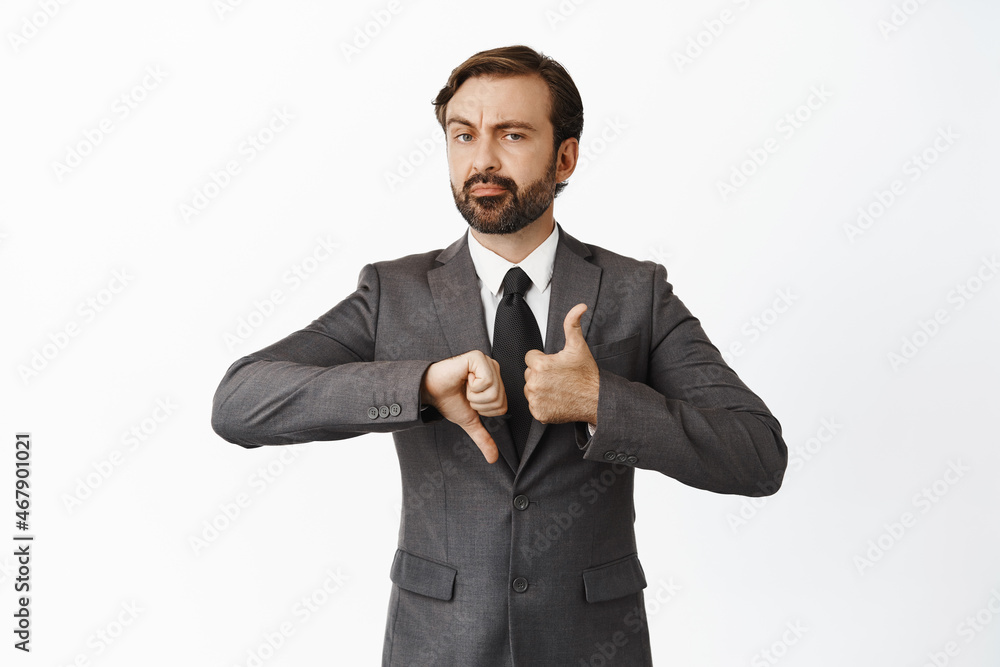 Indecisive boss makes decision, shows thumbs up and thumbs down, like ...