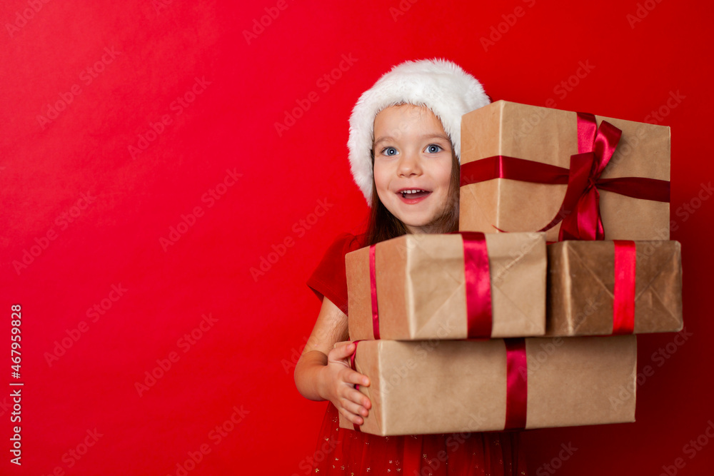 Merry Christmas and happy holidays. Portrait of a pending happy girl in ...